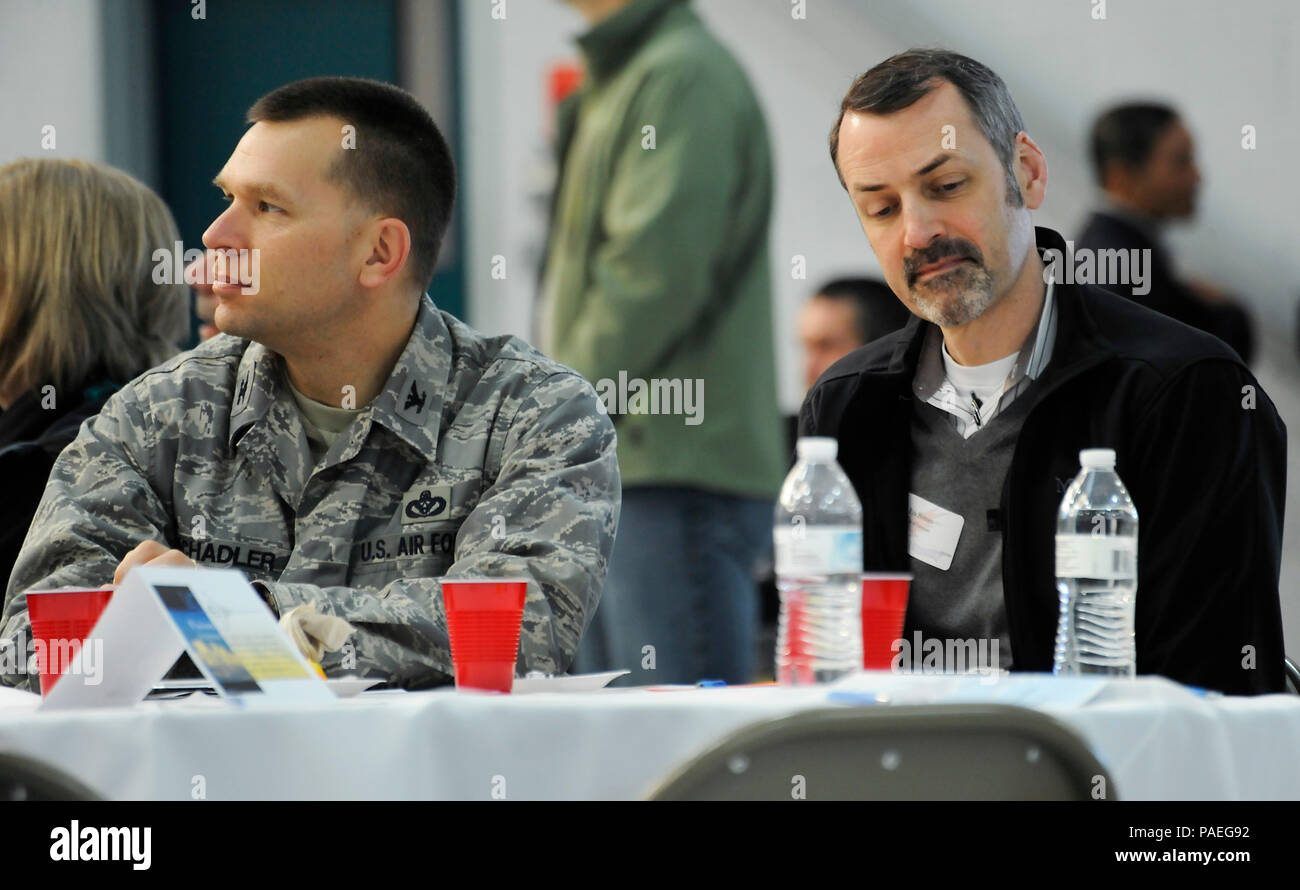 Col. Eric Schadler, 142nd Fighter Wing Medical Group commander, left ...
