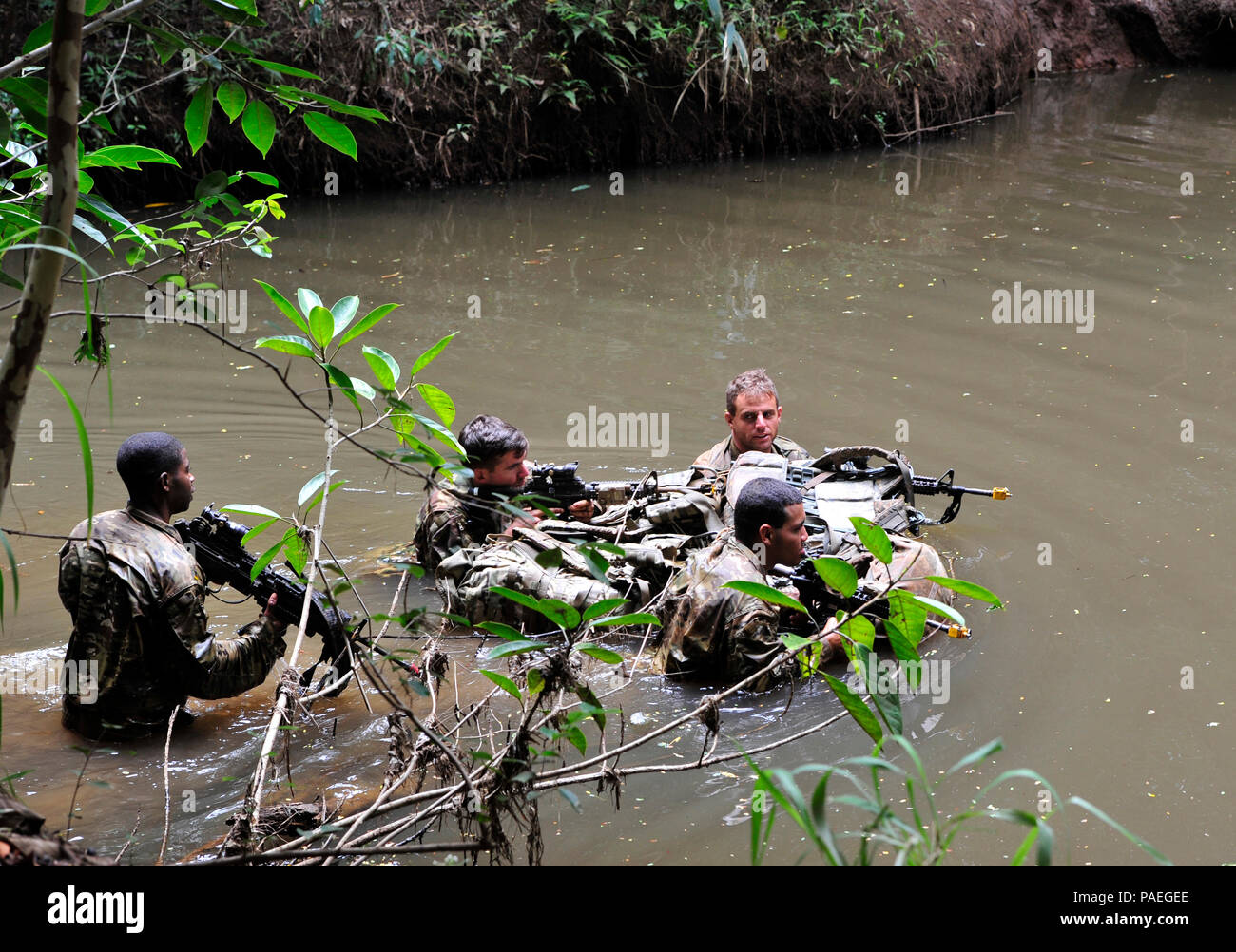 Students utilize a ruck raft to conduct waterborne operations, at the ...