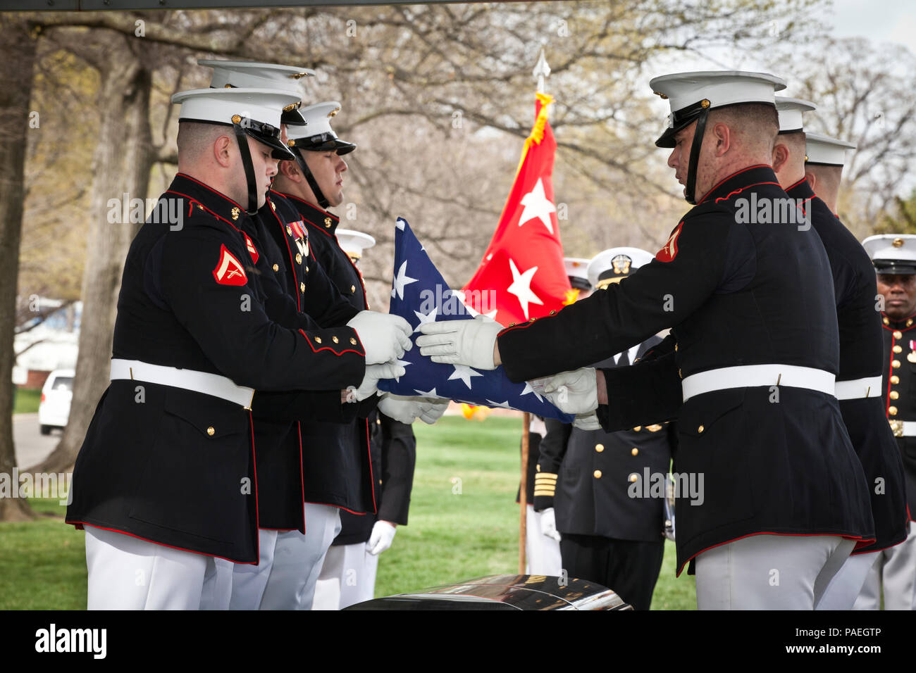 Body Bearers with Marine Barracks Washington fold a flag during a ...
