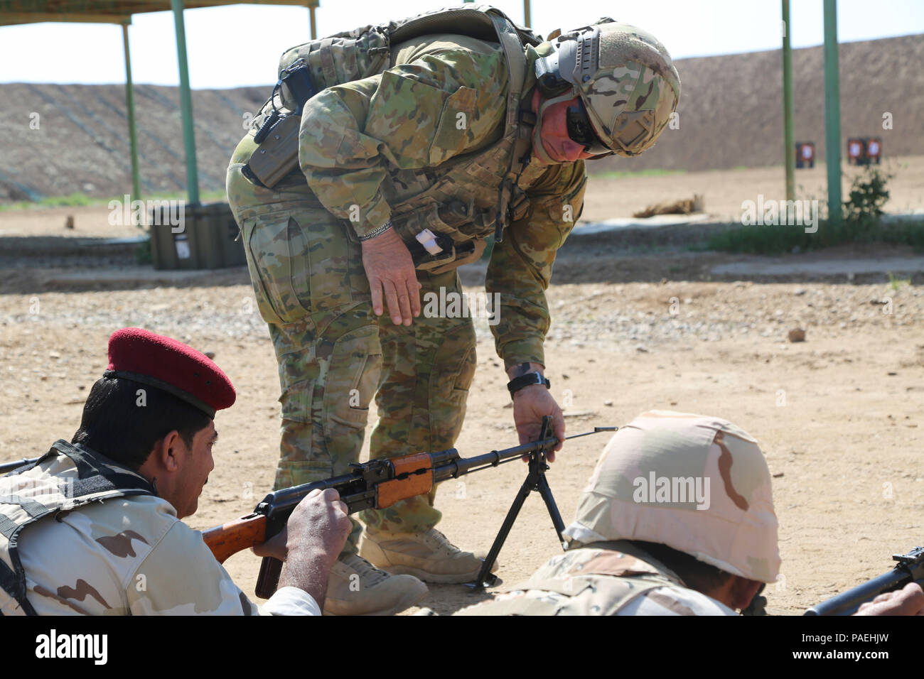 An Australian soldier with Task Group Taji ensures soldiers assigned to ...