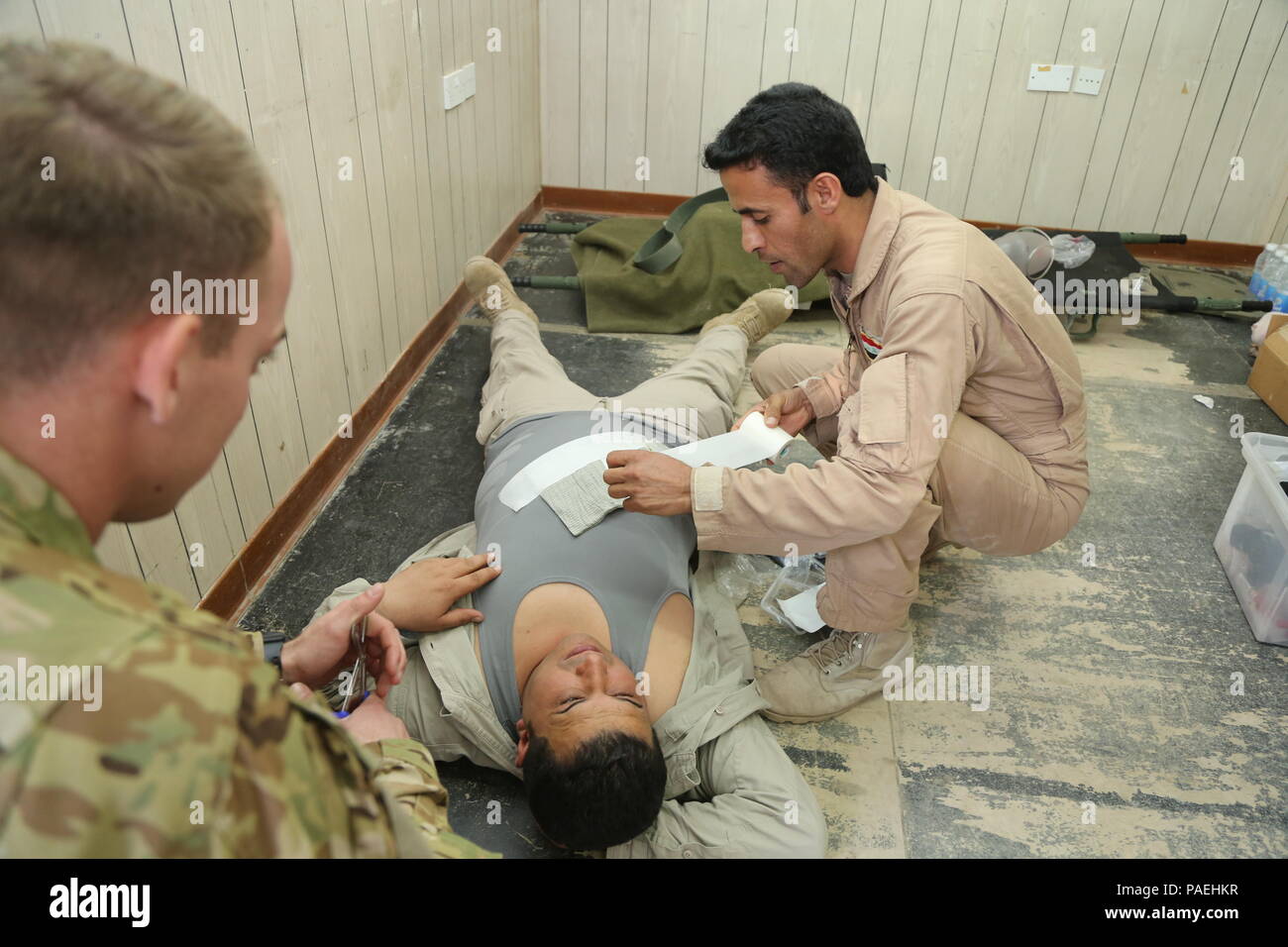 U.S. Army Sgt. Aaron Marsh, left, a medic with Company F, 2nd Battalion ...
