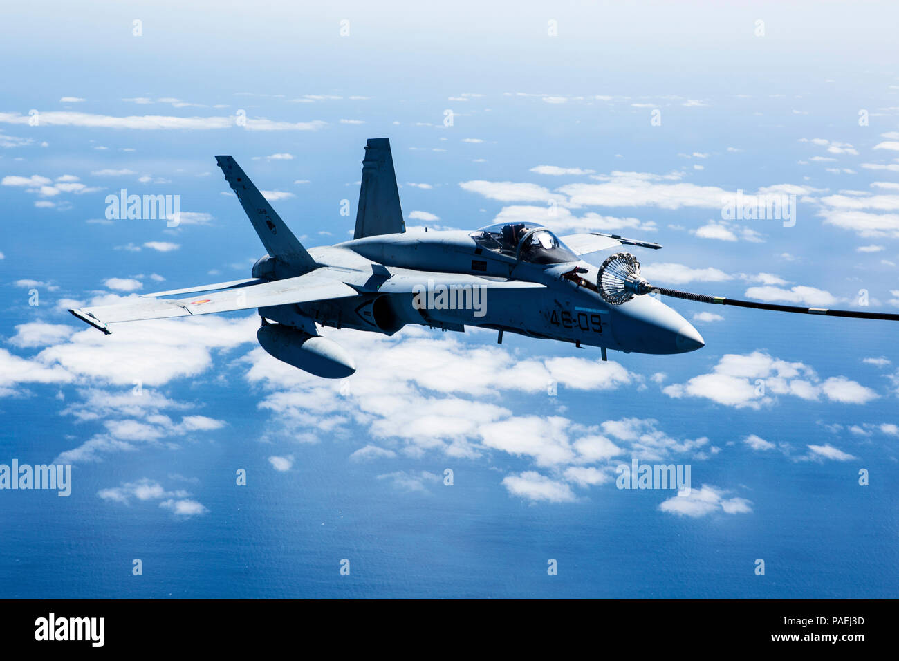 A Spanish Air Force F/A-18 Hornet with 462 Squadron receives fuel from ...