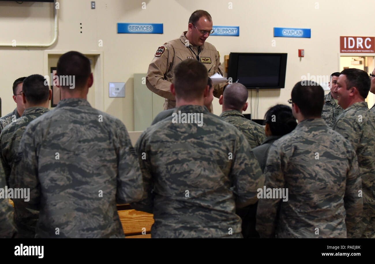Air Force Maj. Joshua Allen, a troop commander, conducts a roll call ...