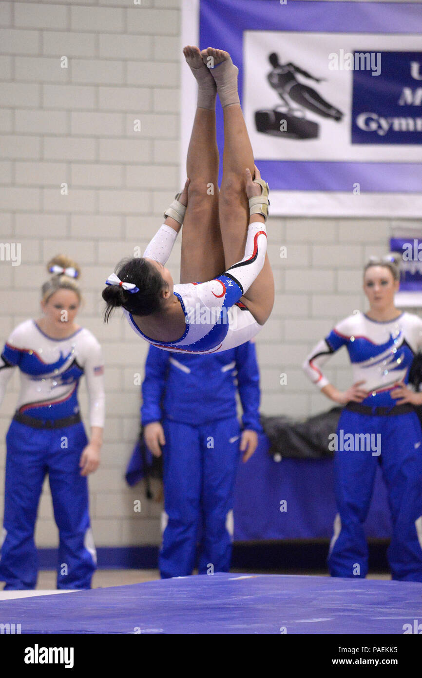 Joey Ching, a senior, performs a floor exercise exhibition as the U.S ...