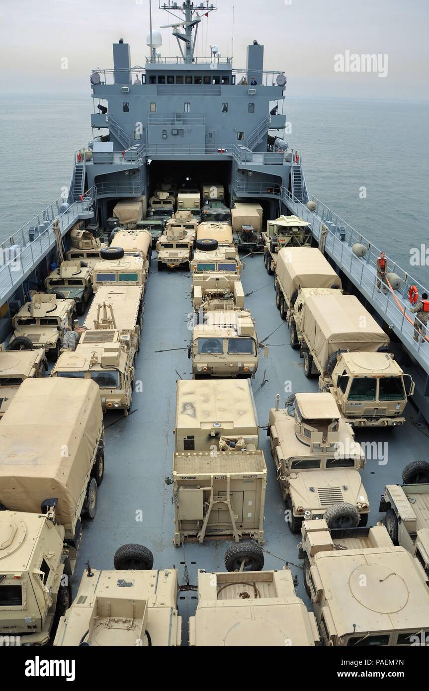 The SP4 James A. Loux, Logistical Support Vehicle-6, moves its cargo ...
