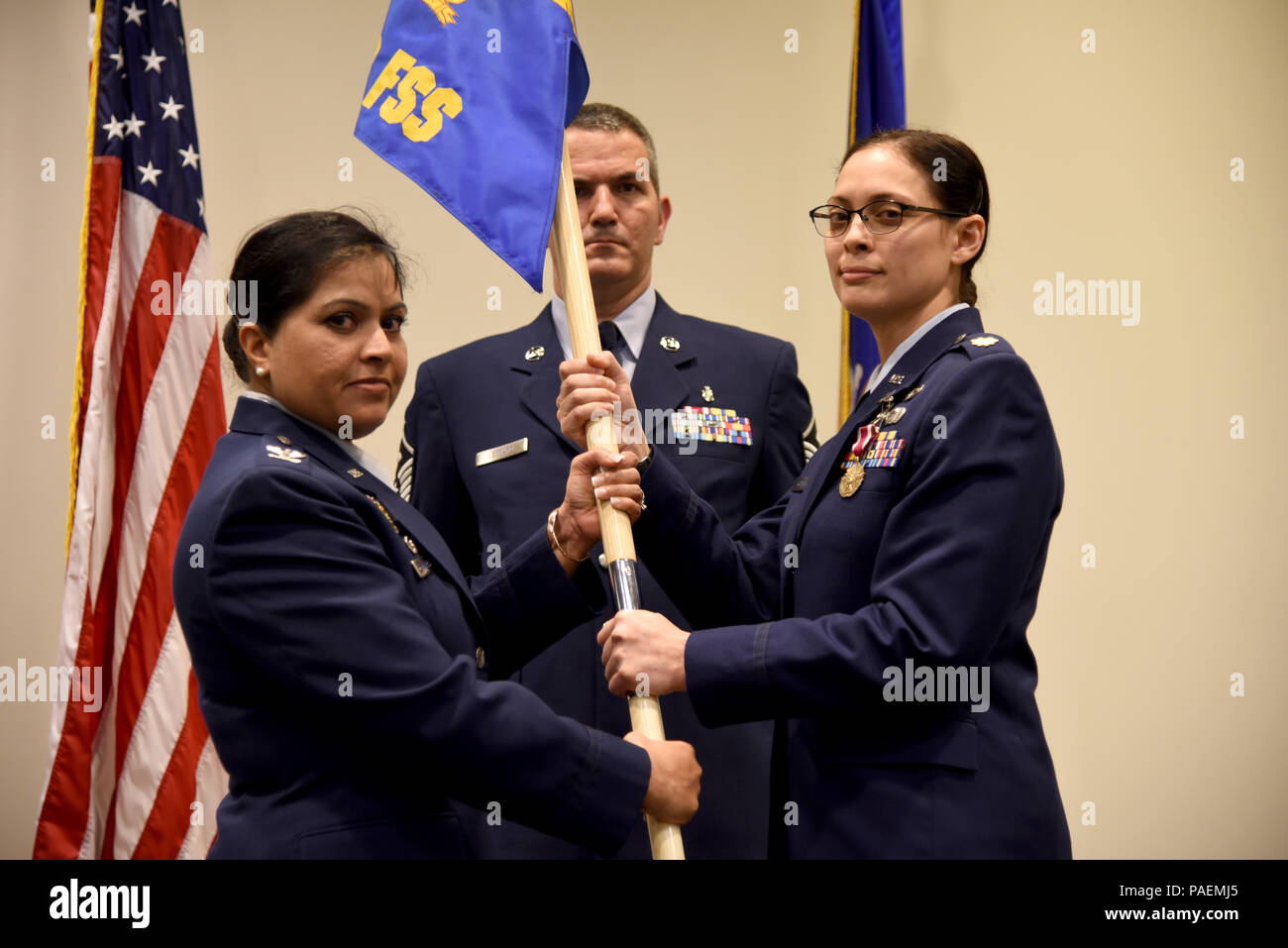 Col. Beena Maharaj, commander of the 403rd Mission Support Group, hands over the guidon for the ...