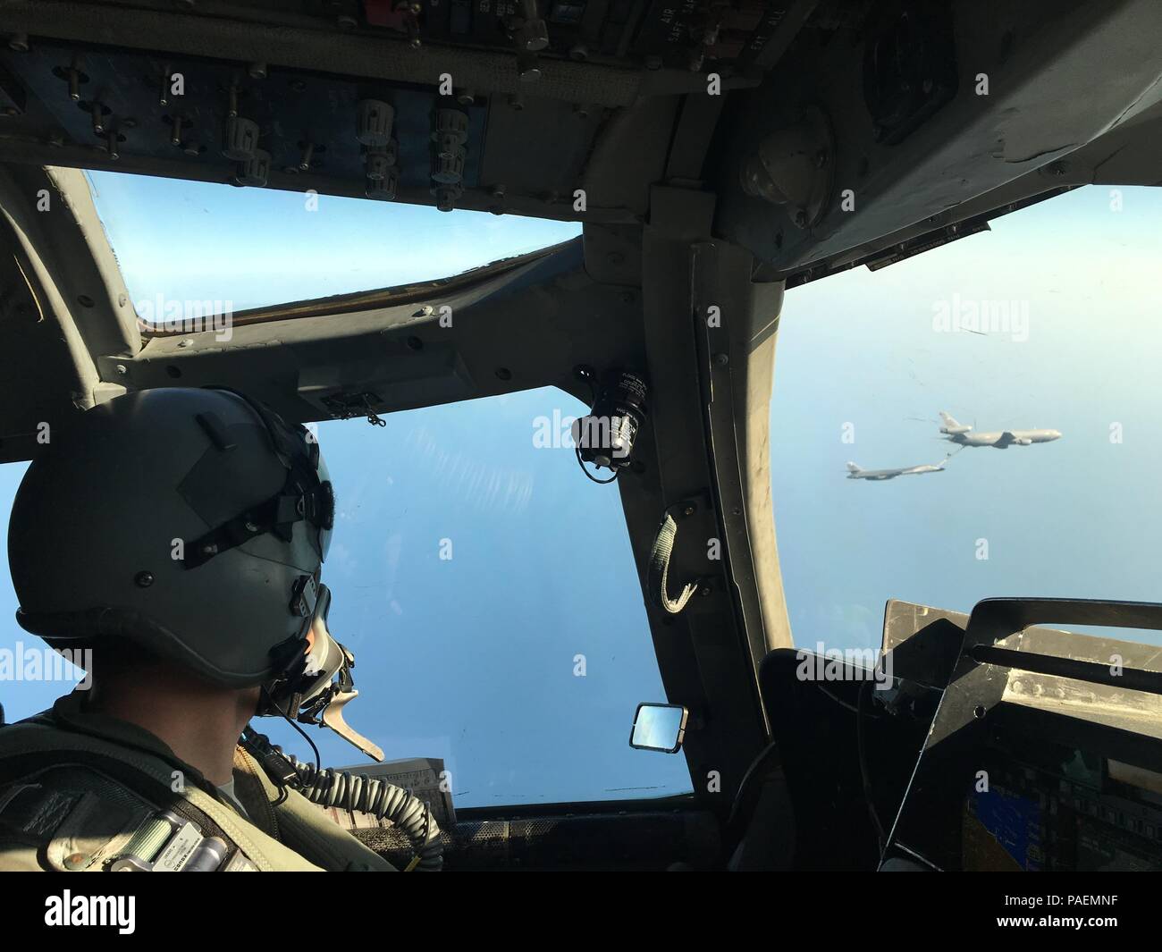 Delta, a 9th Bomb Squadron pilot, watches his team lead air refuel over ...