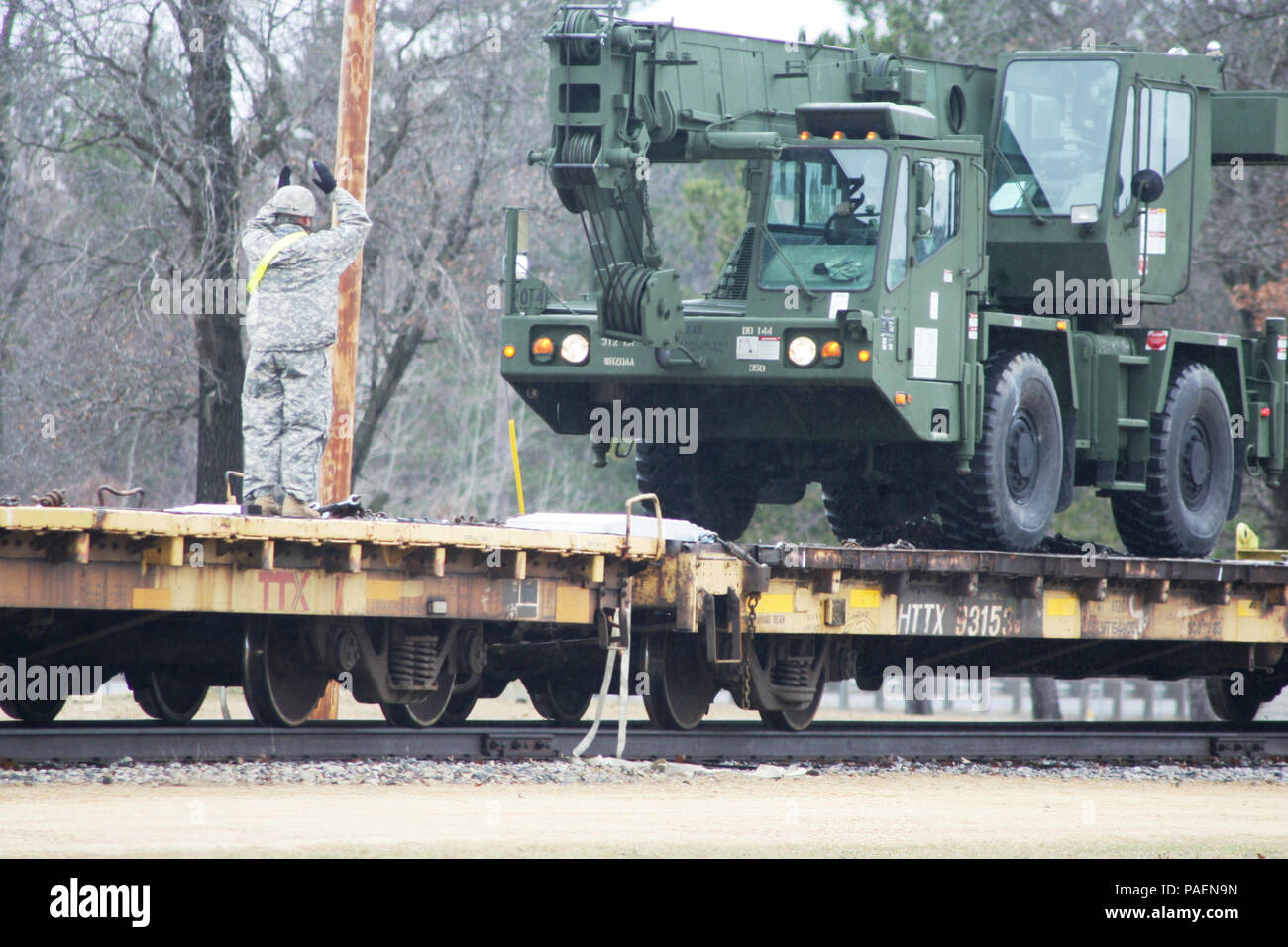 Soldiers load railcars with Army equipment bound for overseas ...