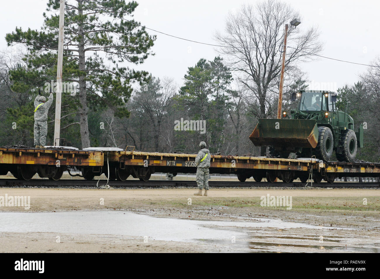 Soldiers load railcars with Army equipment bound for overseas ...