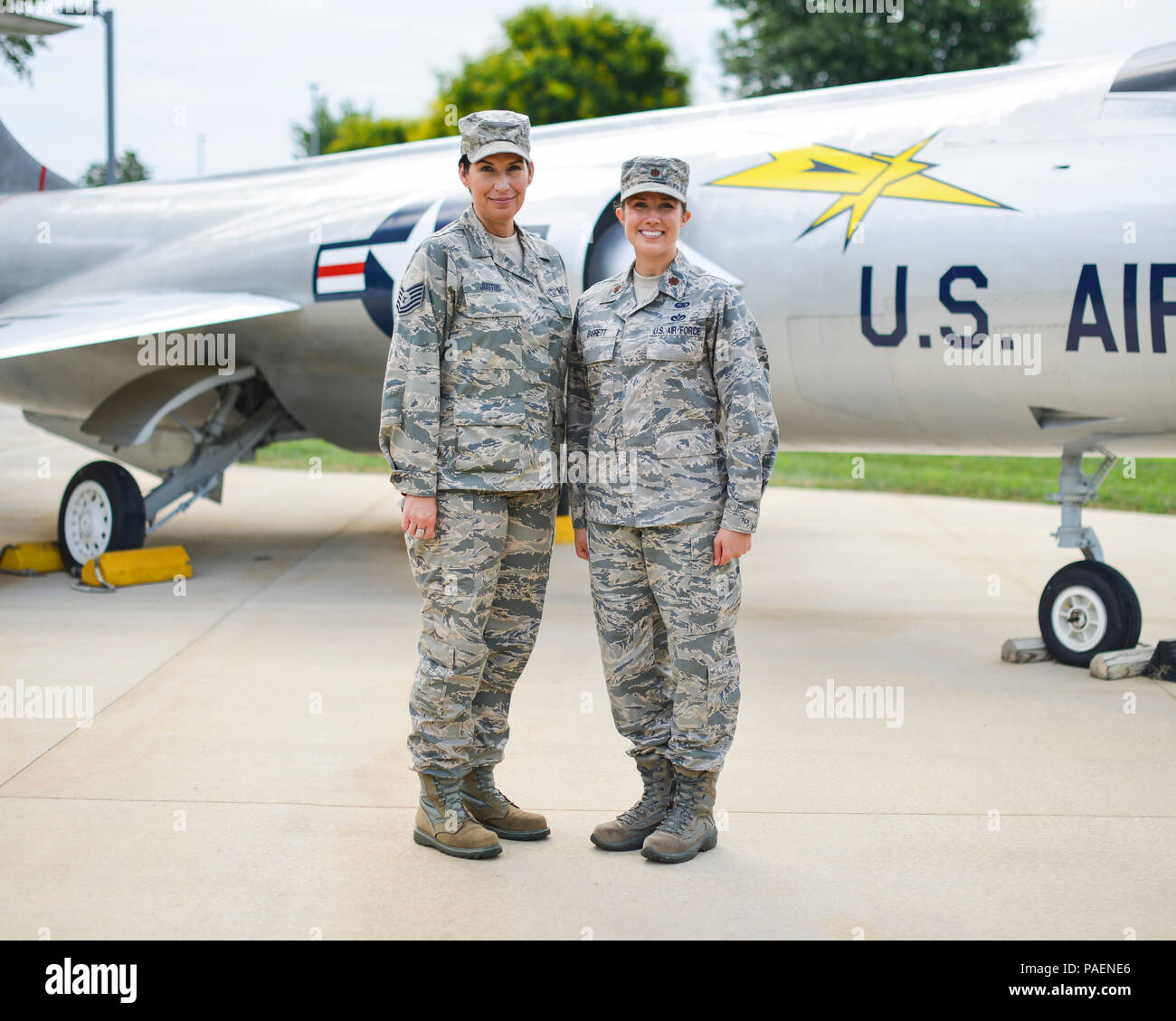 Major Tarren Barrett and Tech. Sgt. Stephanie Justus pose for the MEO ...