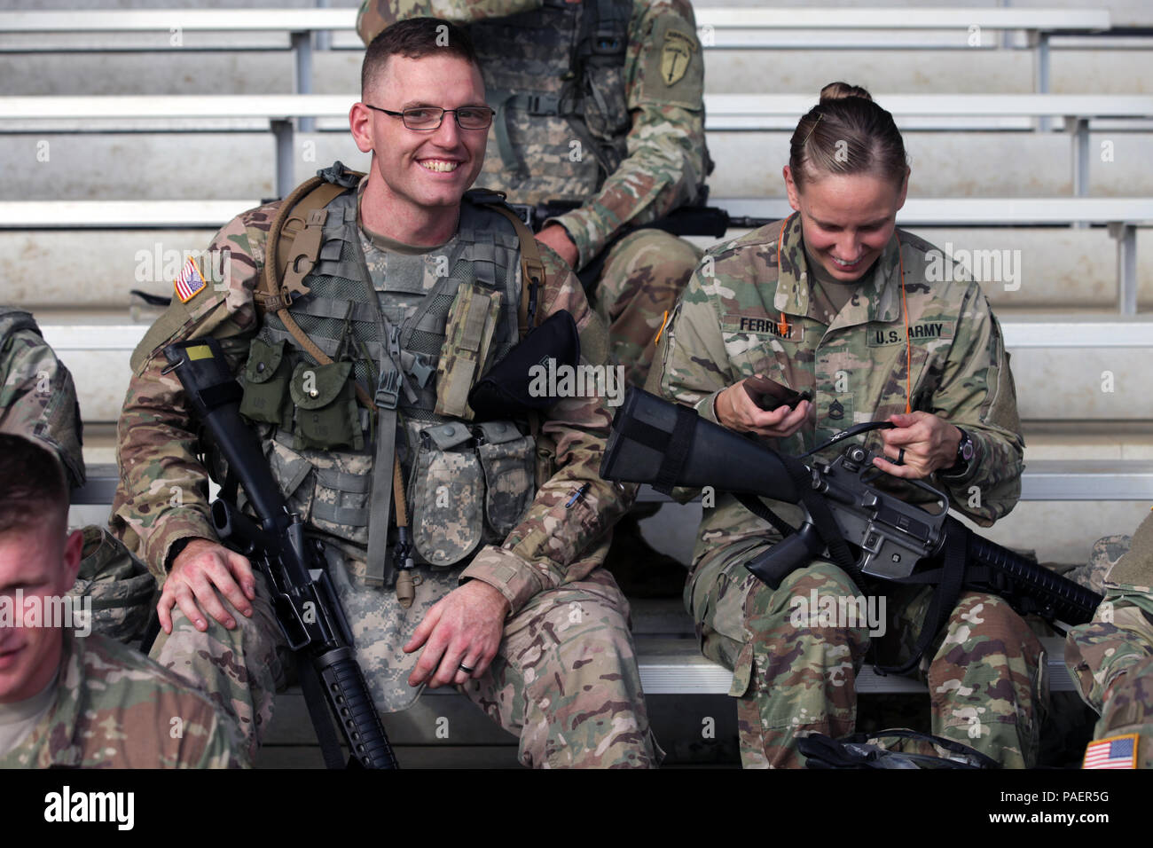 Staff Sgt. Adam Fekete and Sgt. 1st Class Jordan Ferrari get ready for ...