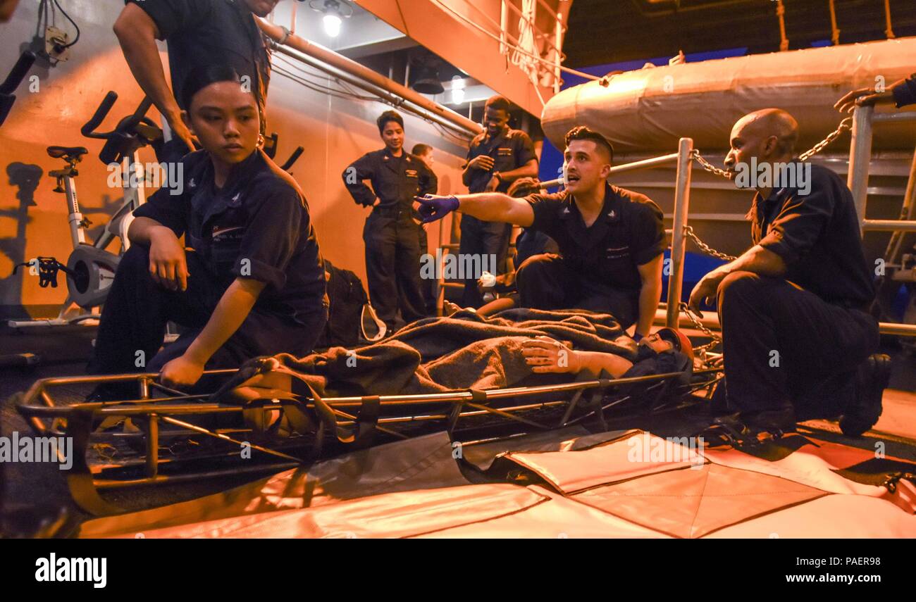 180716-N-PJ626-0027 PHILIPPINE SEA (July 16, 2018) Sailors treat ...