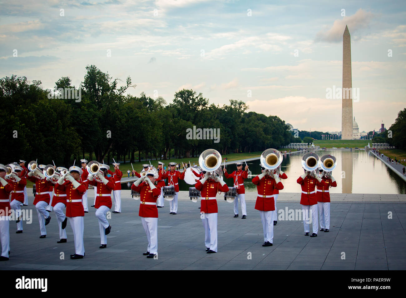 The Commandant’s Own Drum and Bugle Corps performs during the sunset ...