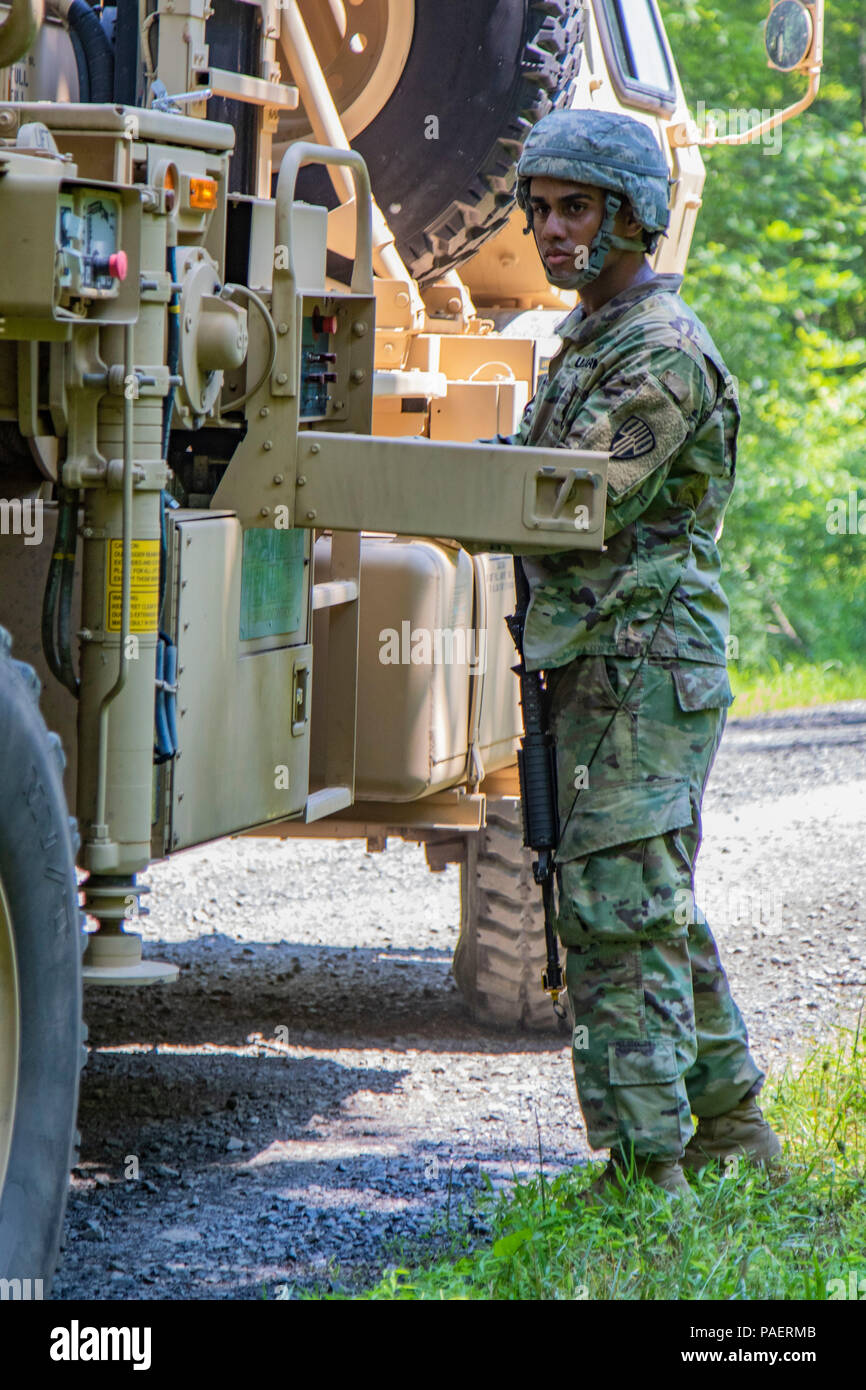 U.S. Army Spc. Johan Alvarez, a wheeled vehicle mechanic with the ...