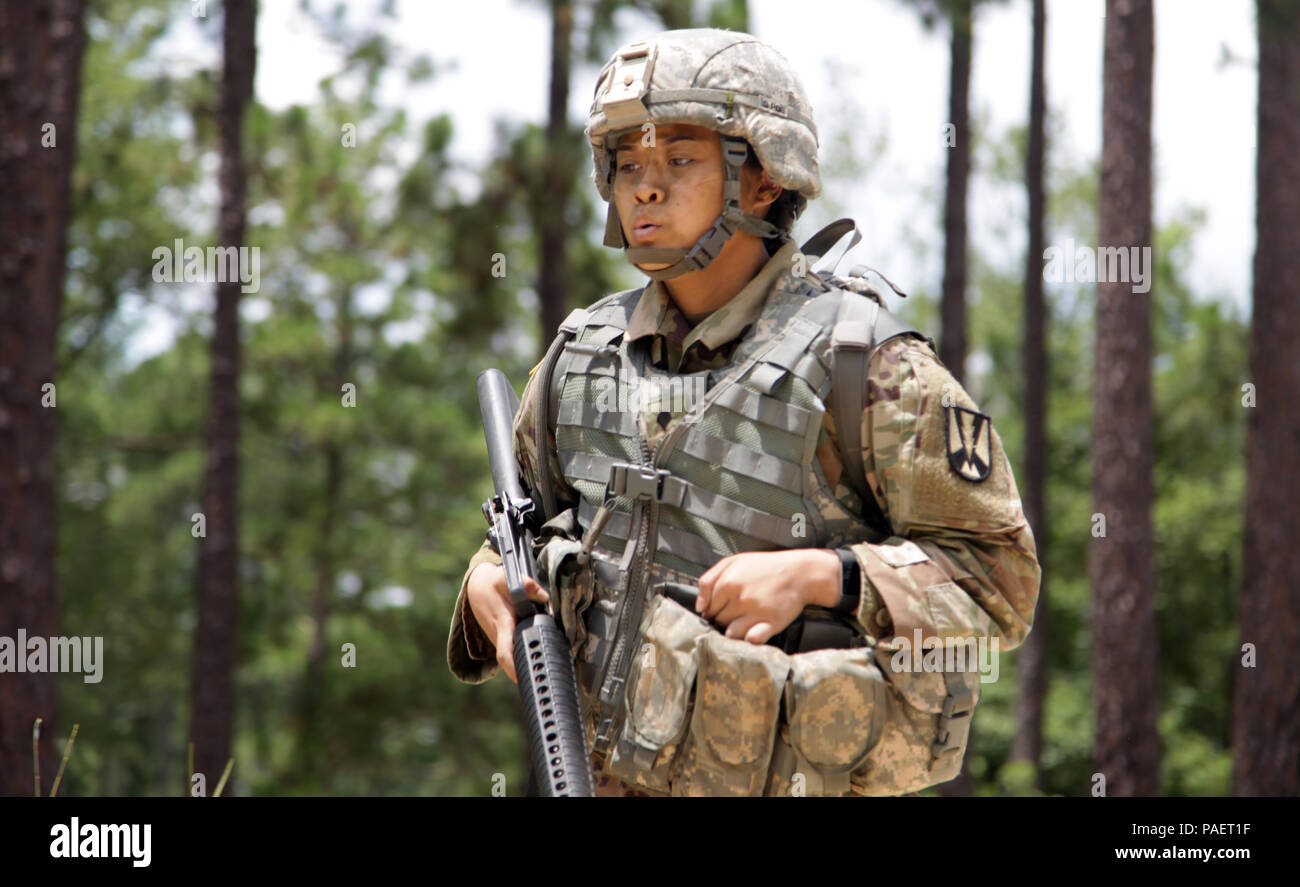 Spc. Diane Hoang from the U.S. Army Training Center, runs through the ...