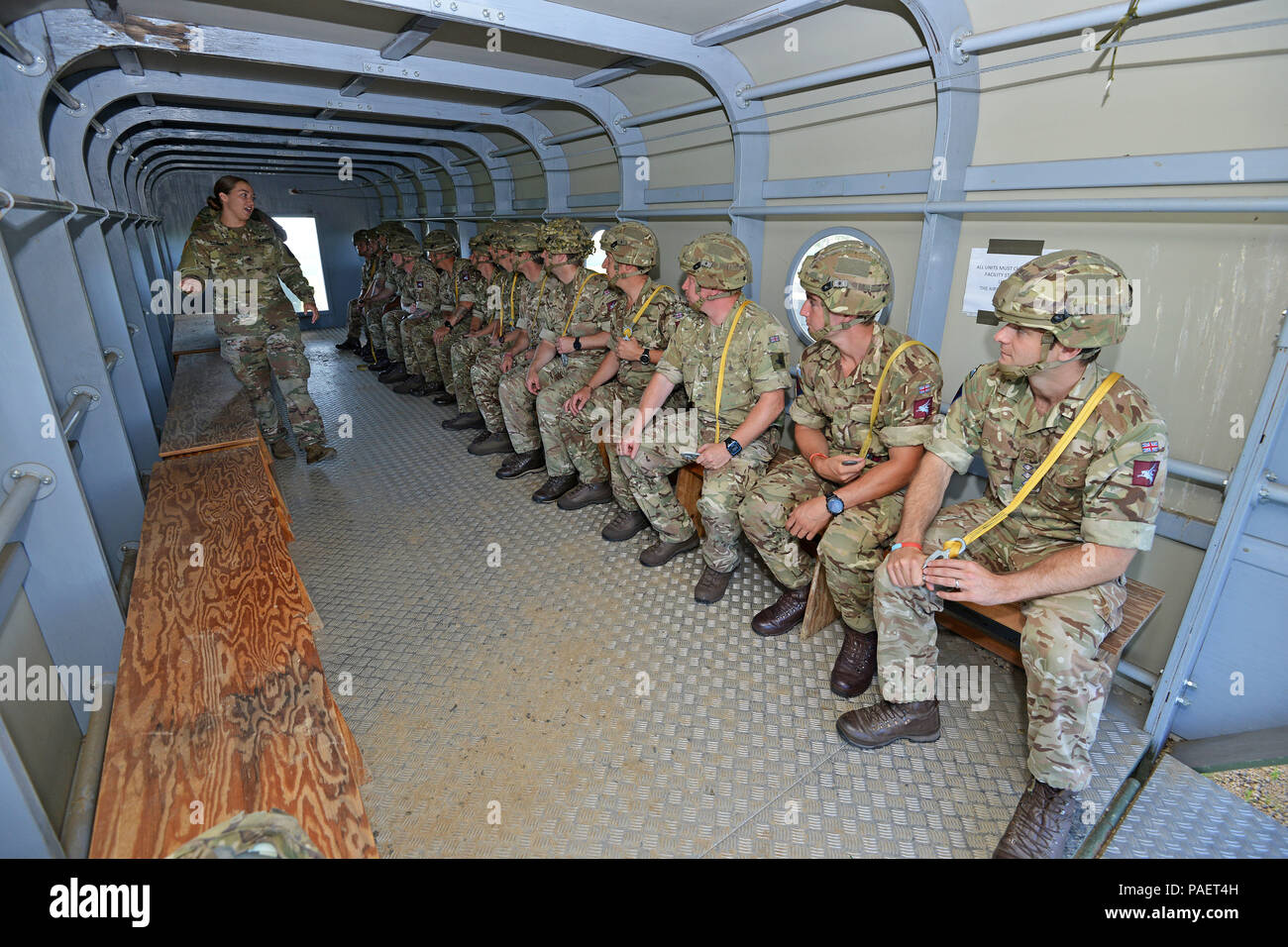 A U.S. Army Paratrooper assigned to 173rd Airborne Brigade, shows CH-47 ...