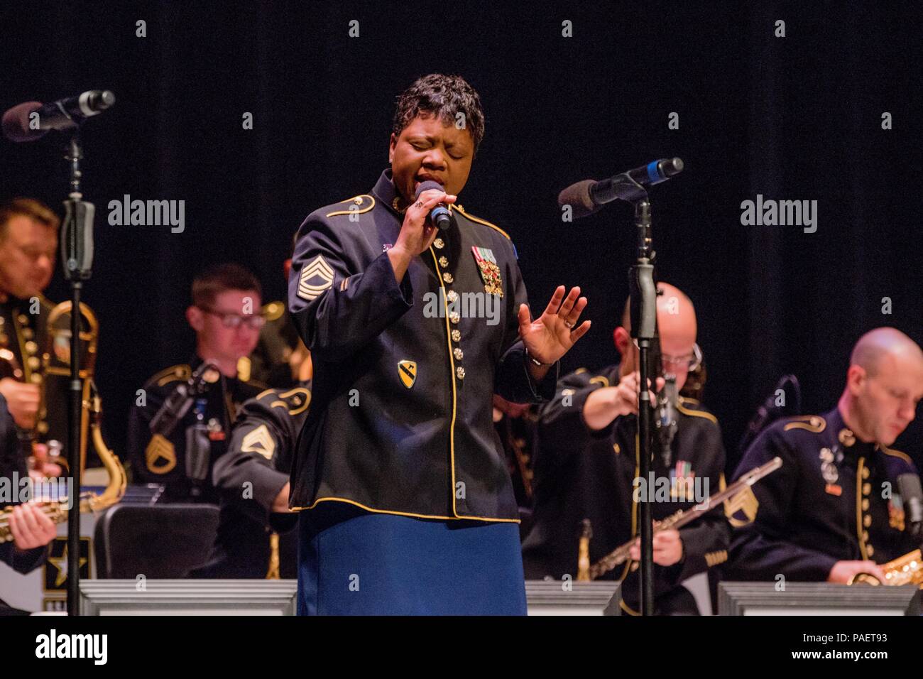 Featured vocalist, Master Sgt. Marva Lewis, sings a series of songs ...