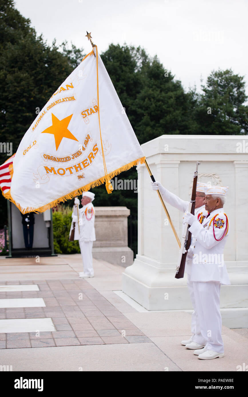 Veterans of Foreign Wars National Honor Guard wait for a wreath-laying ...