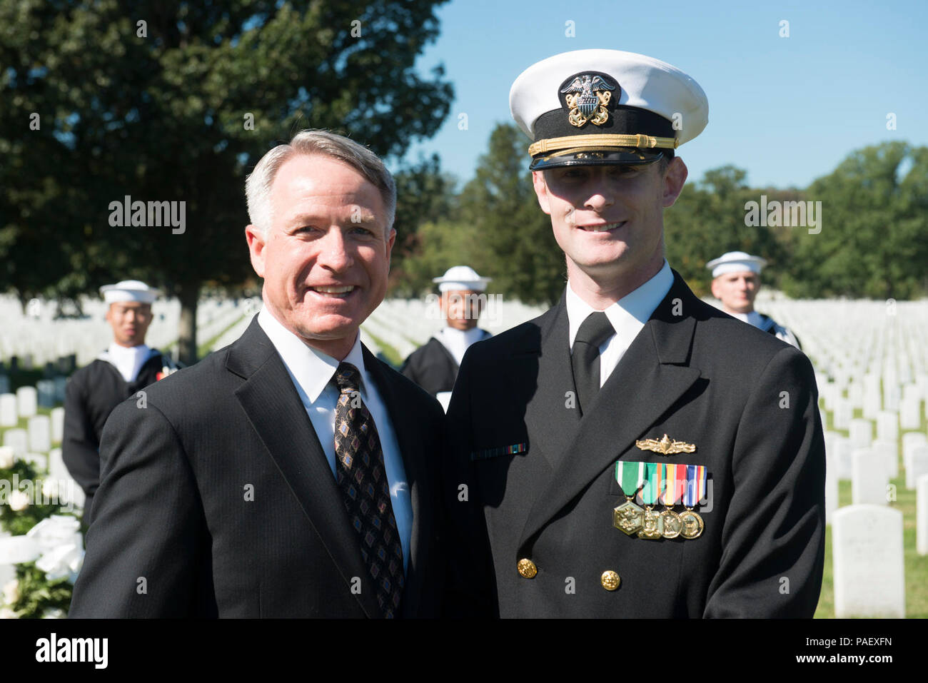 U.S. Navy Commander Kirk S. Lippold poses for photographs after the ...