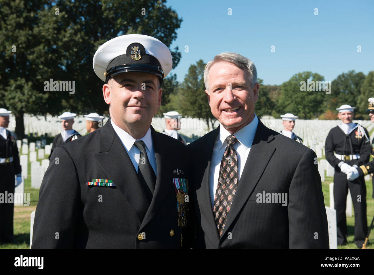 U.S. Navy Commander Kirk S. Lippold poses for photographs after the ...