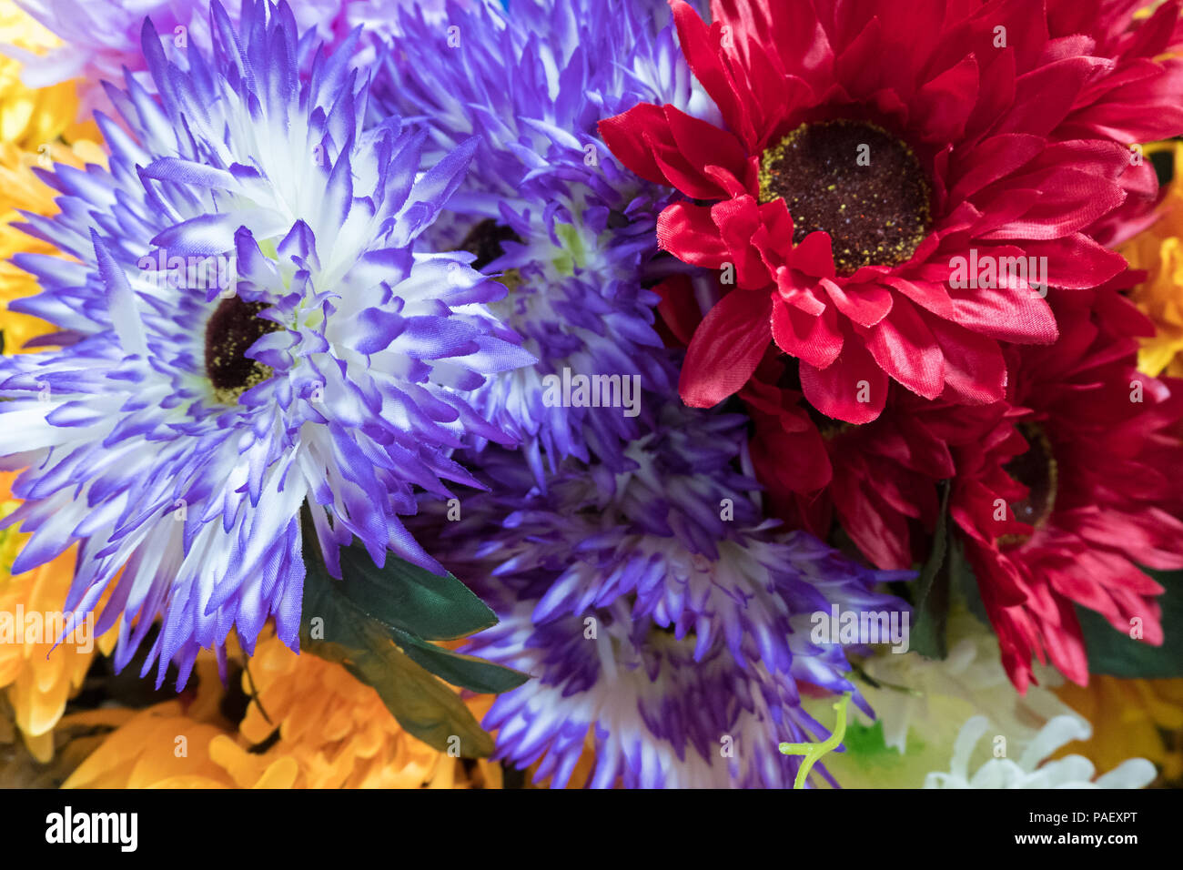 Colorful artificial handcrafted flowers background Stock Photo - Alamy