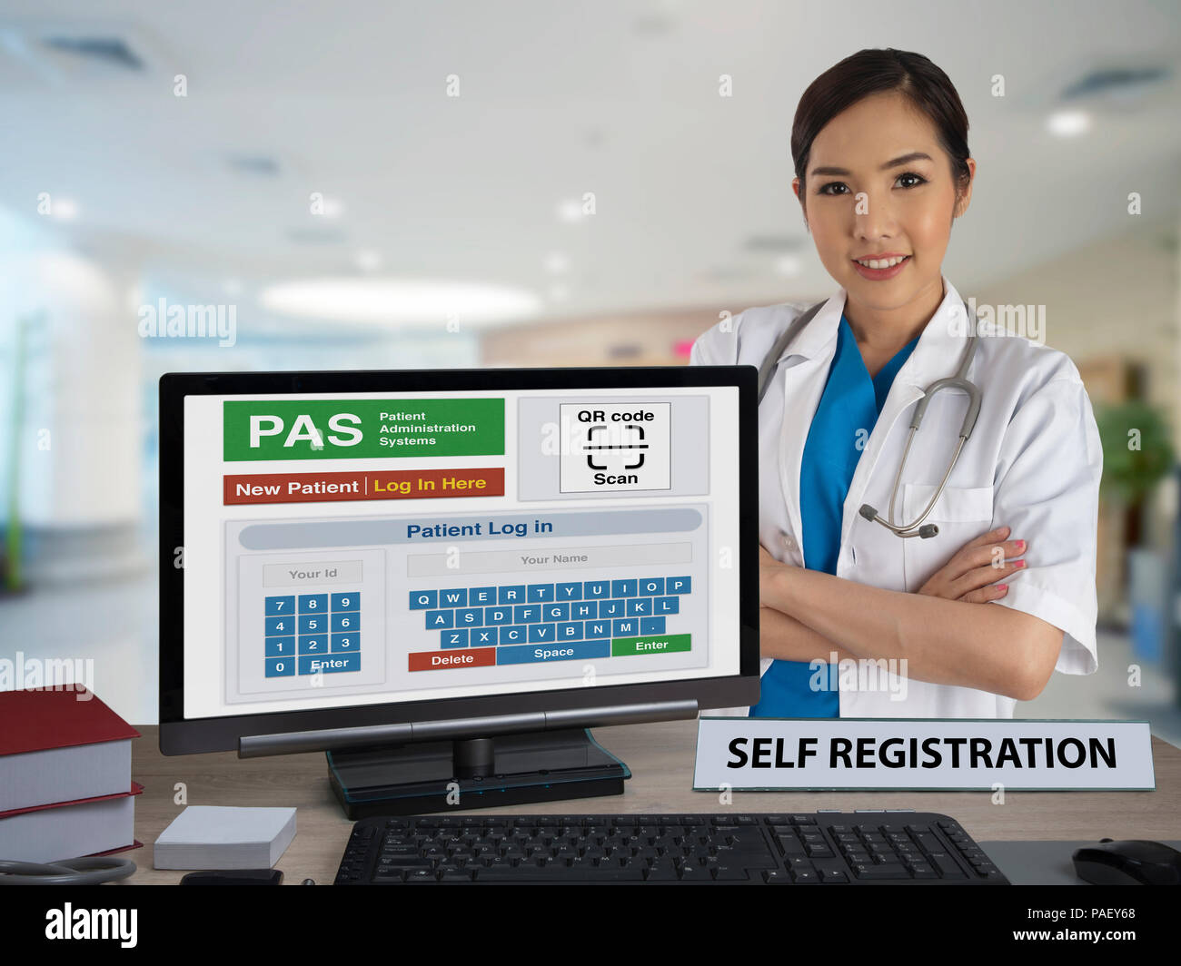 Female doctor standing behind computer that showing self registration ...