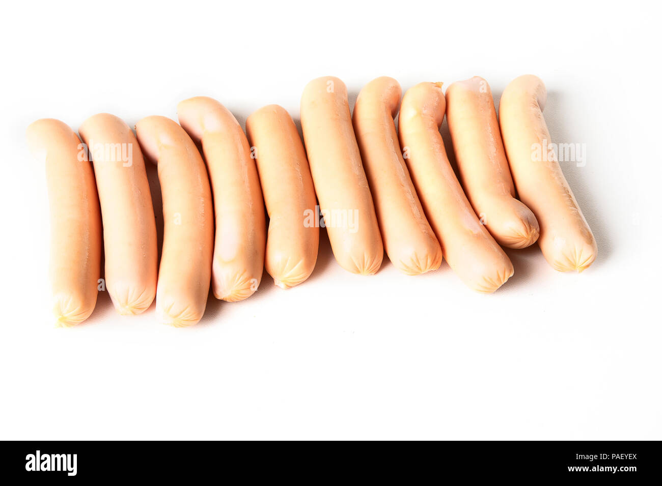 Fresh sausages on white background Stock Photo - Alamy