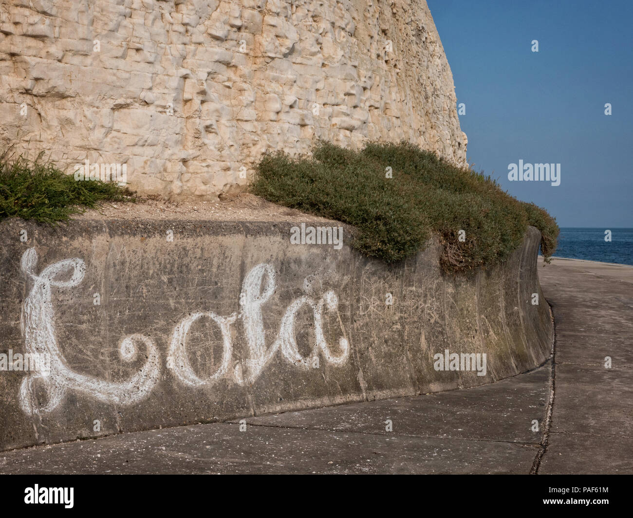 Chalk graffiti on sea wall in Birchington Kent UK Stock Photo - Alamy