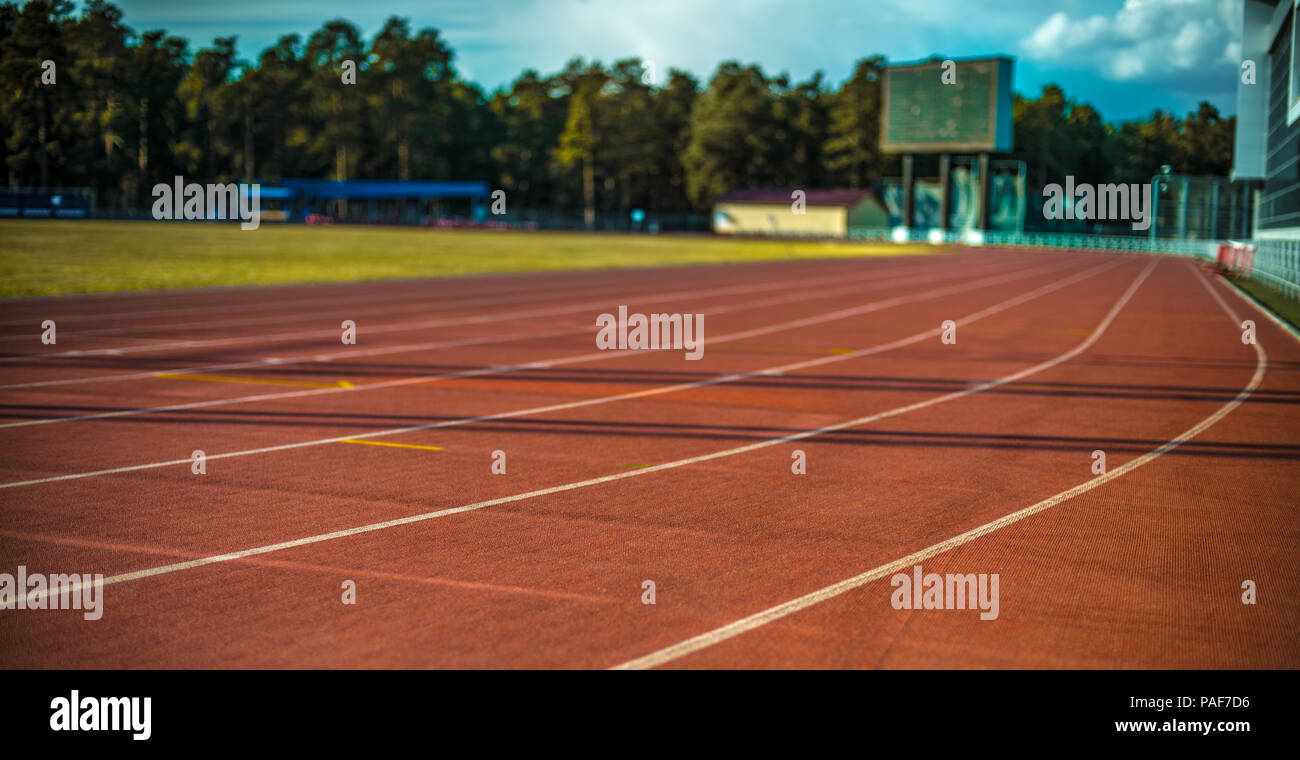 track and field athletics with red soil track, outdoor Stock Photo - Alamy