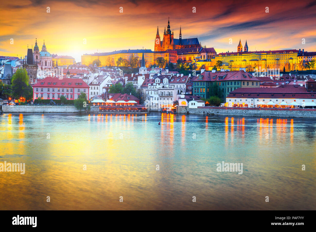 Amazing Prague castle with famous medieval church at colorful sunset ...