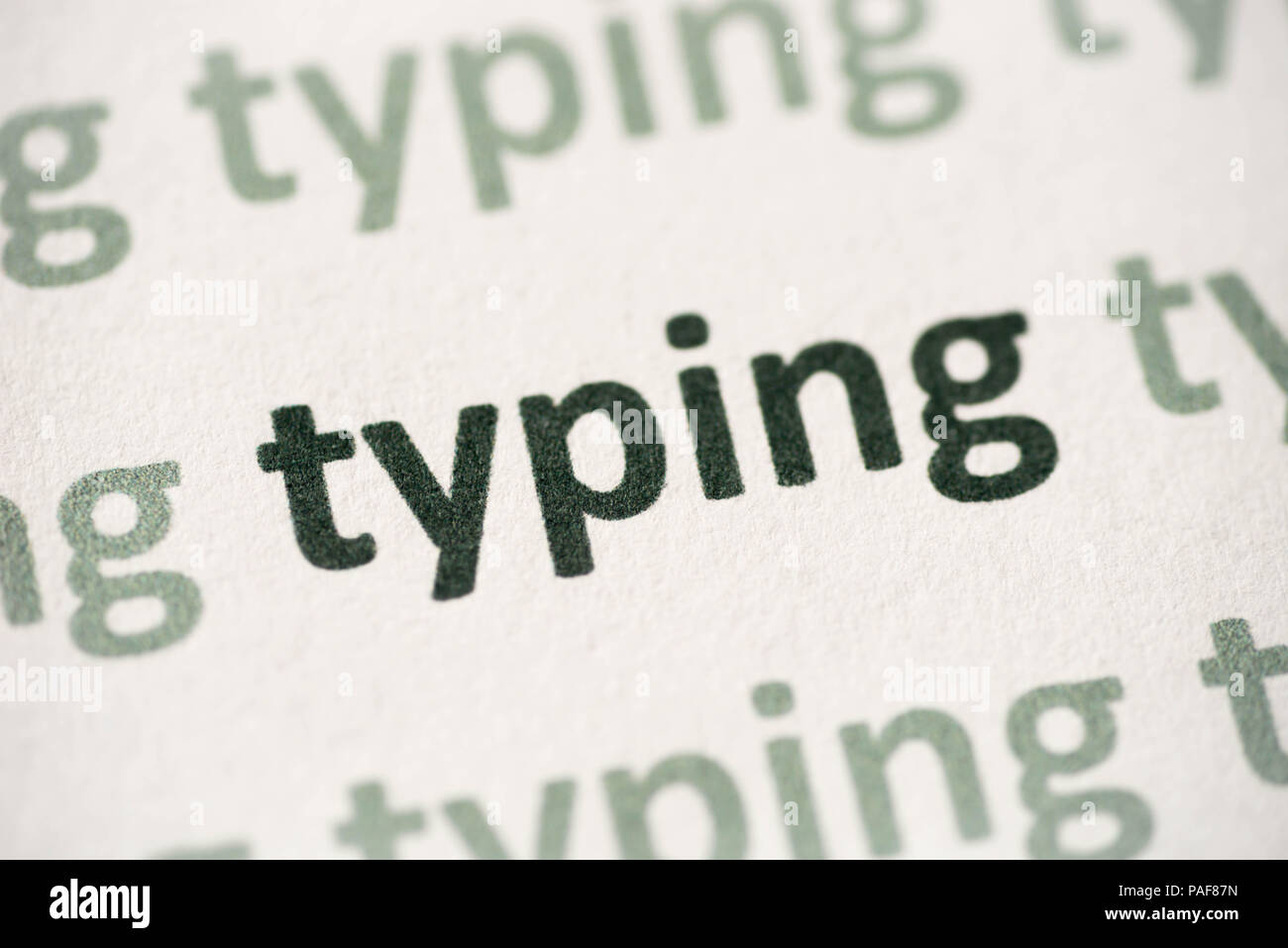 word typing printed on white paper macro Stock Photo - Alamy