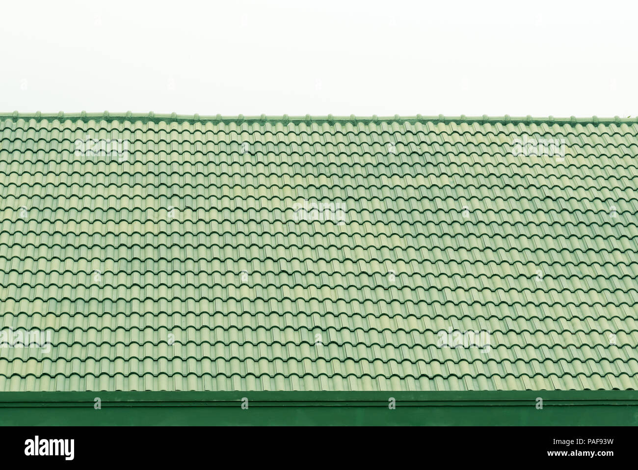 Pattern of green roof tiles, Architecture background Stock Photo - Alamy