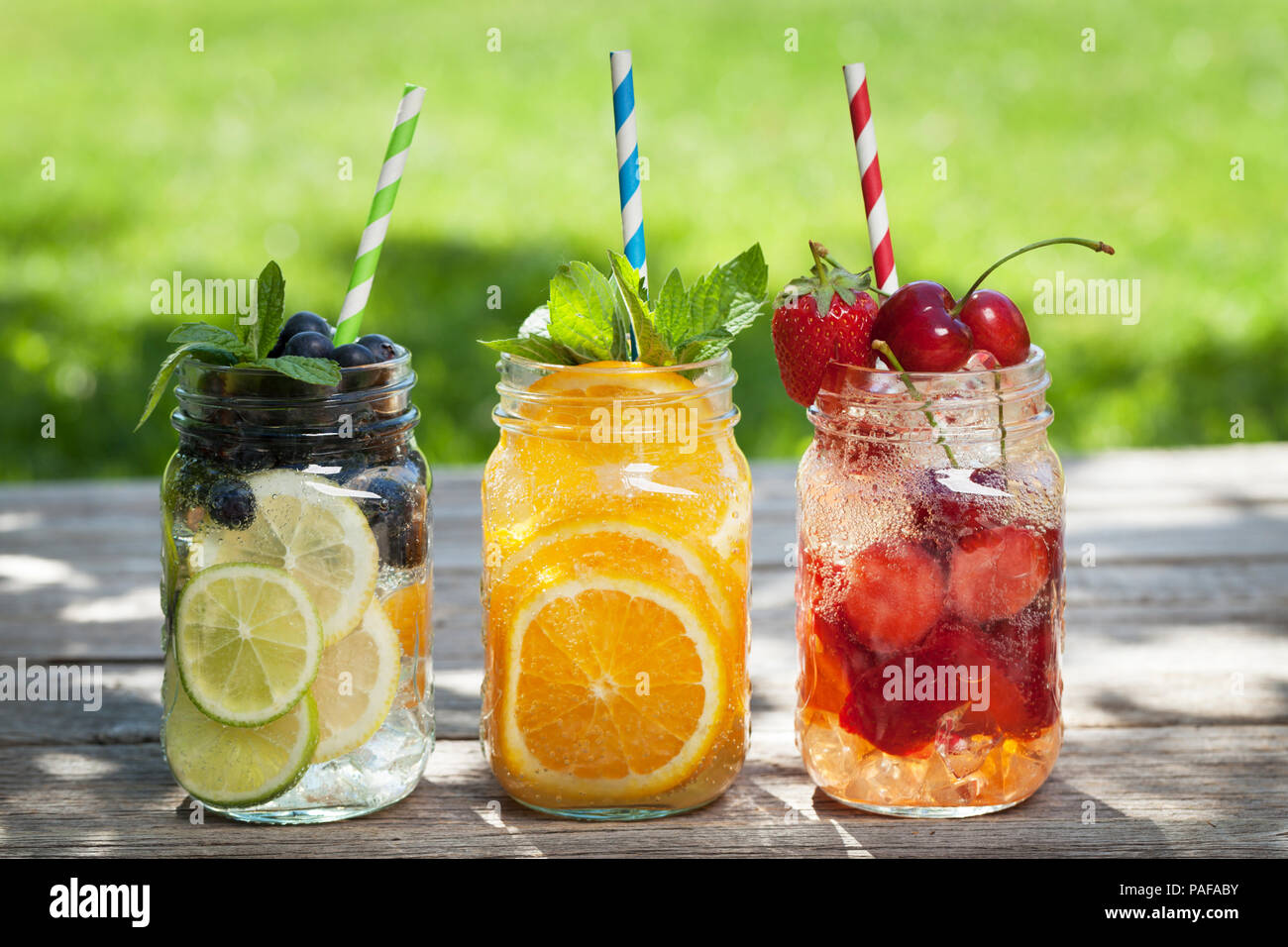 Fresh lemonade jar with summer fruits and berries Stock Photo - Alamy
