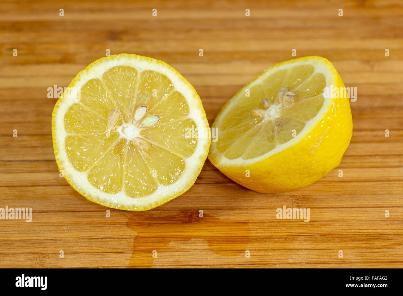 Close up of a lemon sliced in two Stock Photo - Alamy
