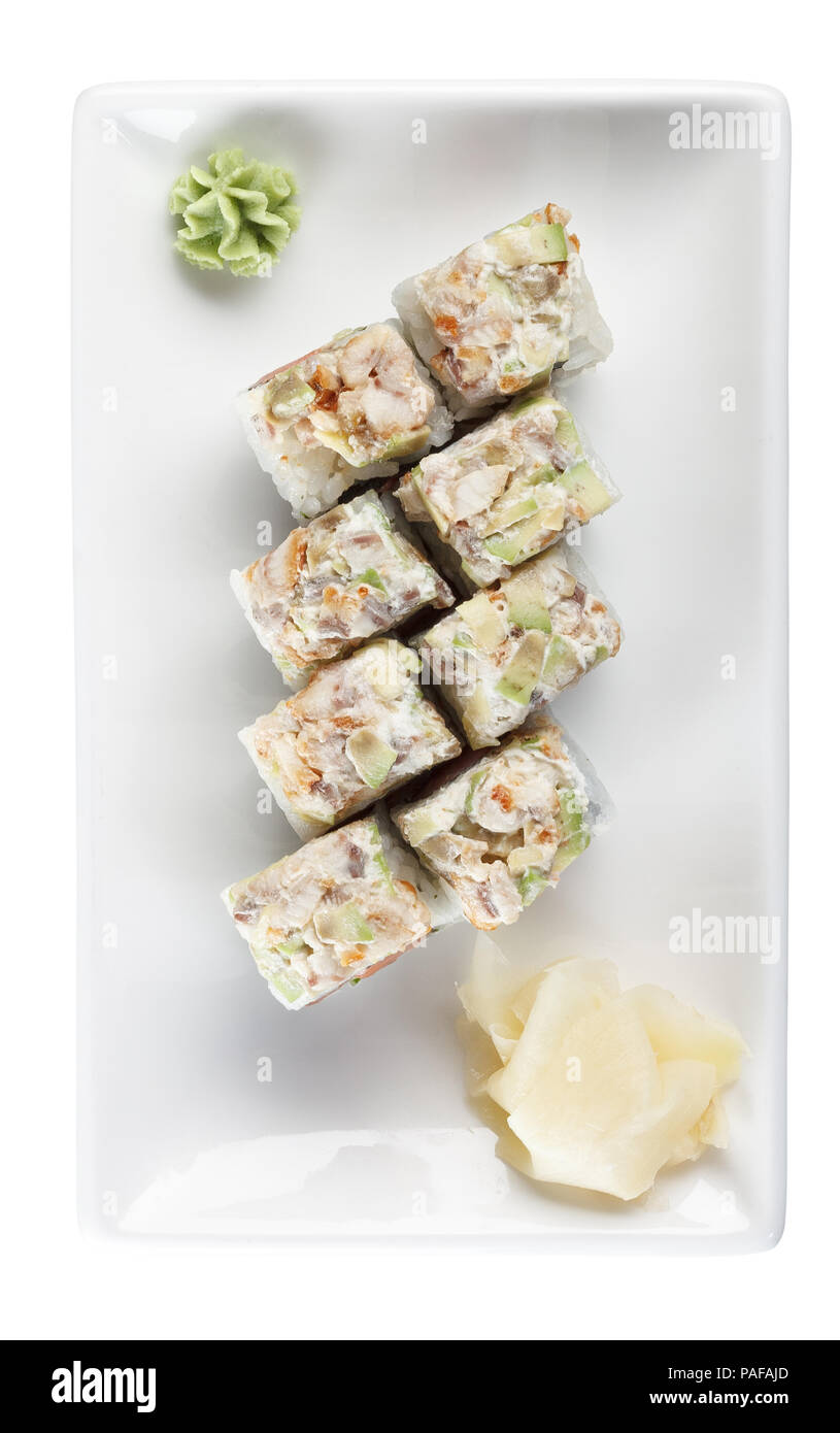 Sushi rolls with tuna and flying fish roe on a plate with wasabi and ...