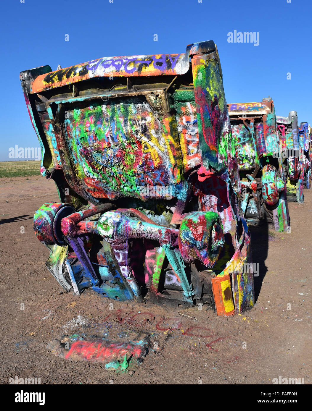 Cadillac Ranch is a brightly colored art installation of colorful ...
