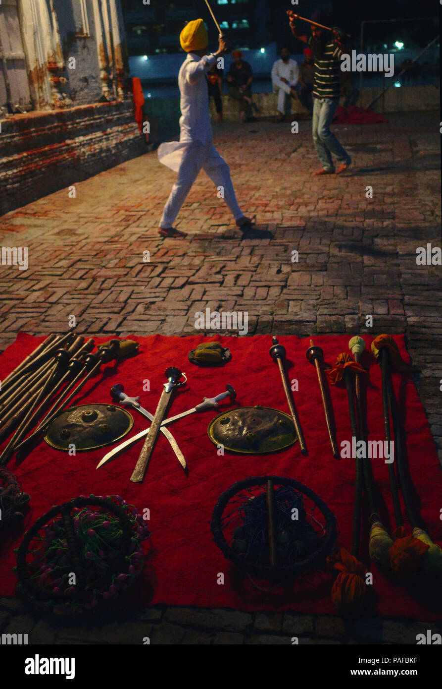 Sikh young men practicing Gutka, the sikh martial art Stock Photo - Alamy