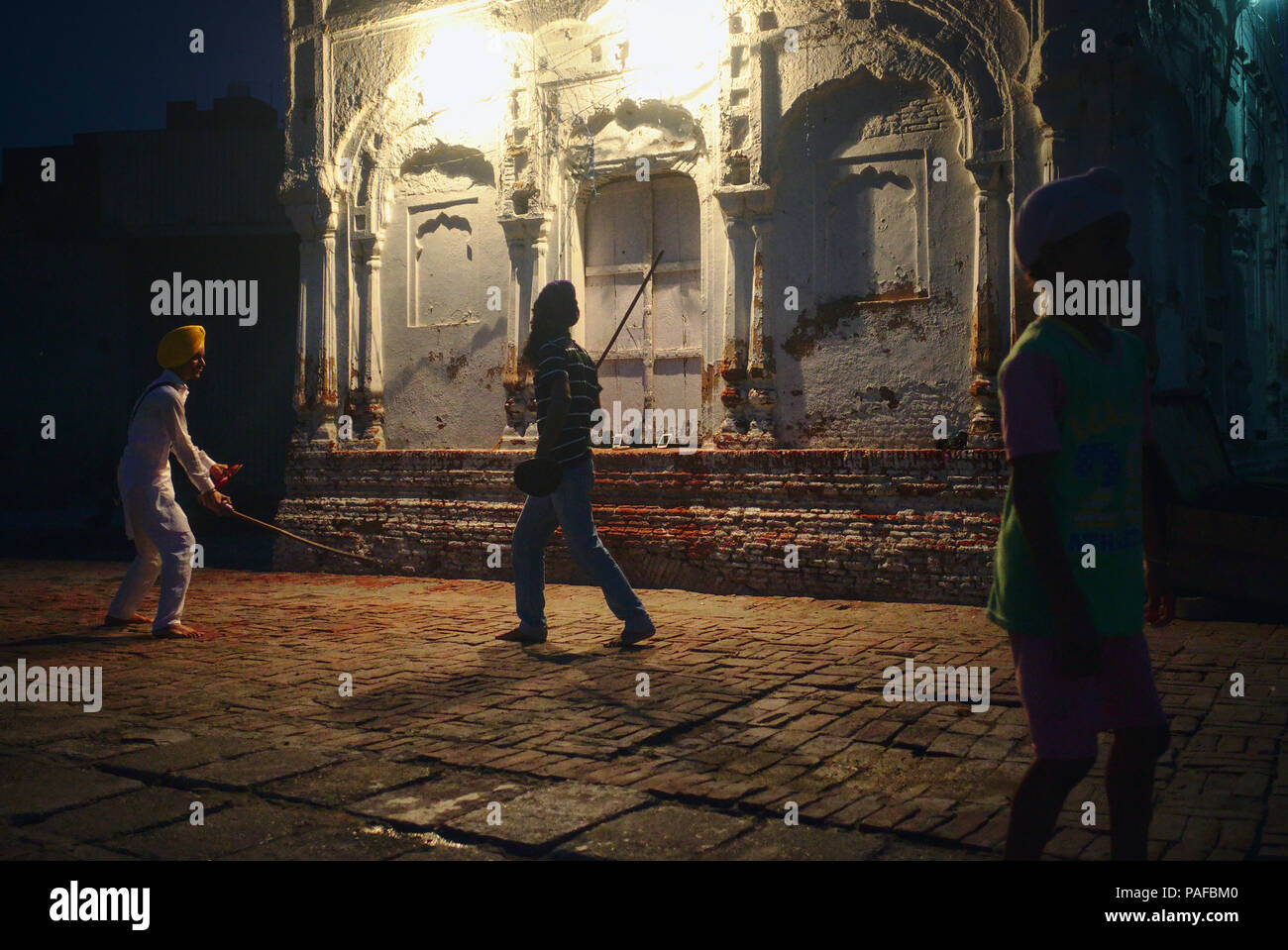 Sikh young men practicing Gutka, the sikh martial art Stock Photo - Alamy