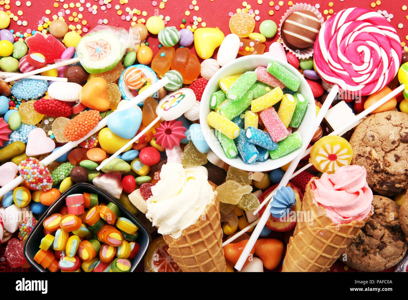 candies with jelly and sugar. colorful array of different childs sweets ...