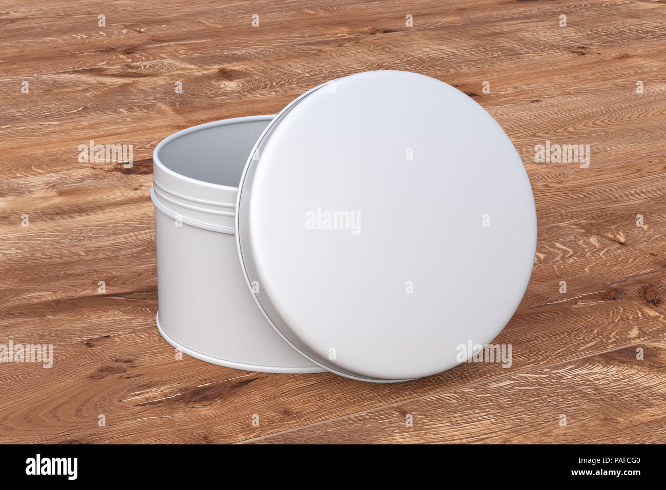 Blank white round tin container box with opened lid on wooden ...