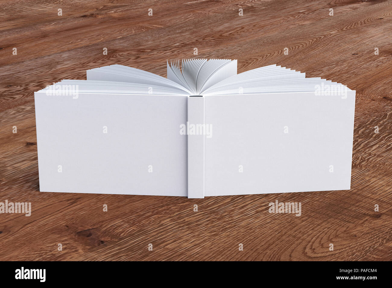 White blank horizontal book cover standing isolated on wooden ...