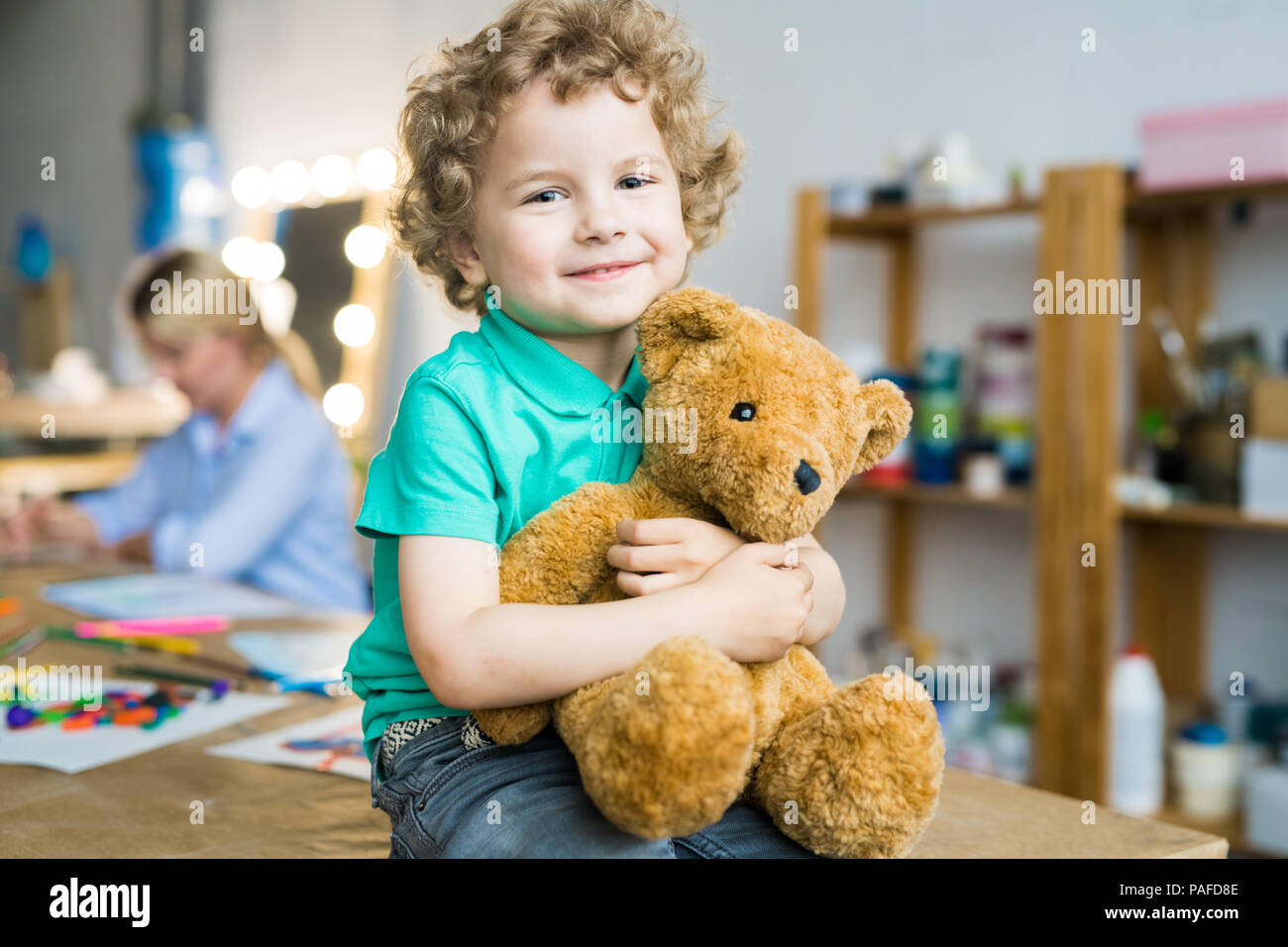 Boy with teddy bear Stock Photo - Alamy