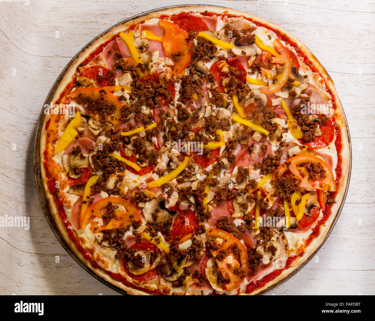Pizza with minced meat and vegetables Stock Photo - Alamy