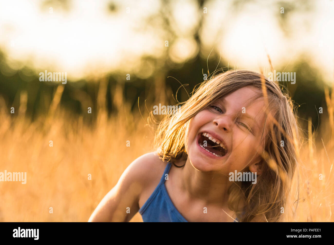 Expressive joy joyful giggle giggling hi-res stock photography and ...