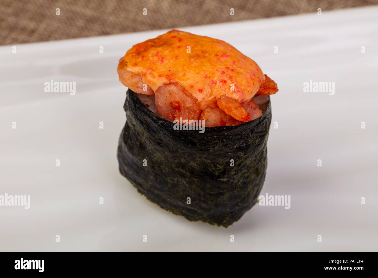 Spicy gunkan sushi with sauce Stock Photo - Alamy