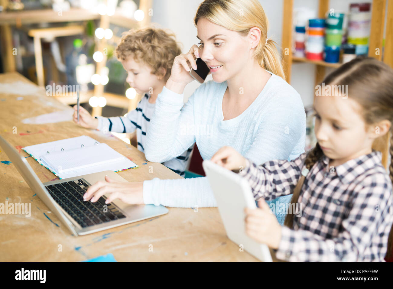 Woman busy at work hi-res stock photography and images - Alamy