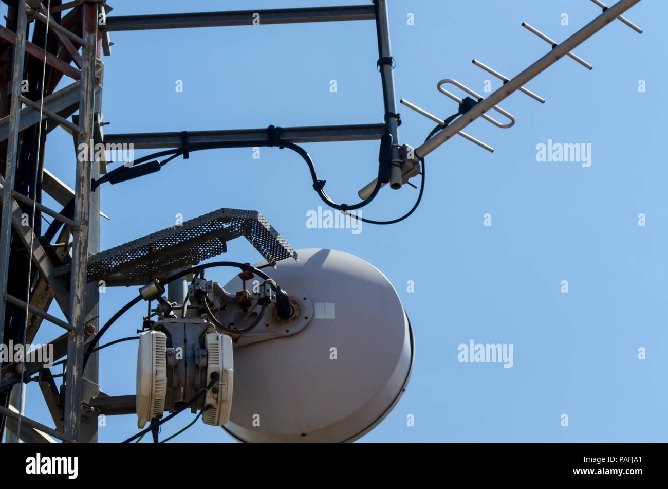 Telecommunication tower with antennas of cellular communication and ...