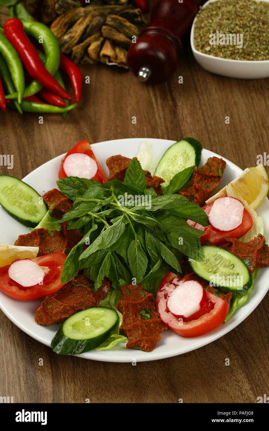 Turkish cig kofte - raw meatball Stock Photo - Alamy