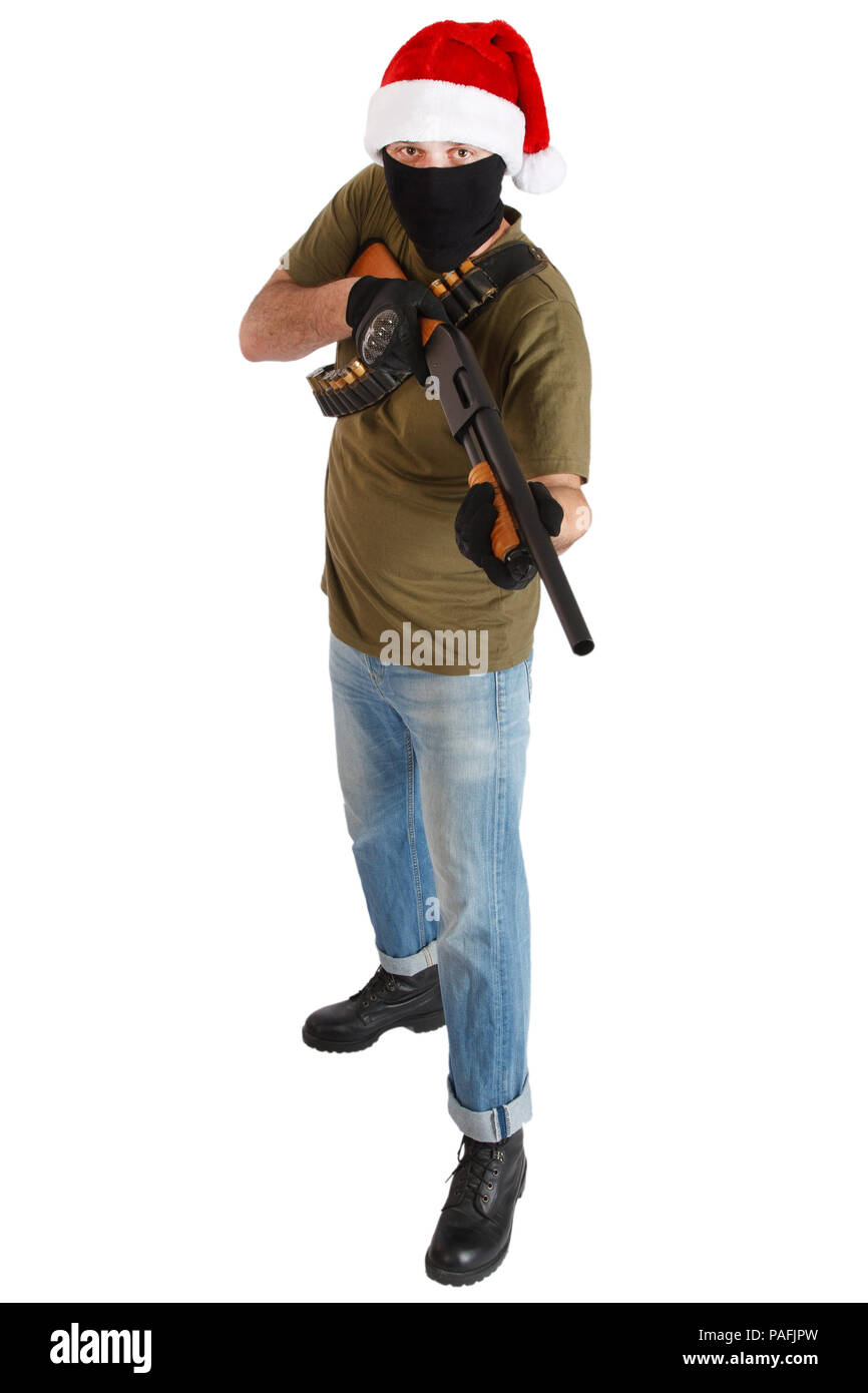 robber in a cap of Santa Claus with shotgun isolated Stock Photo - Alamy