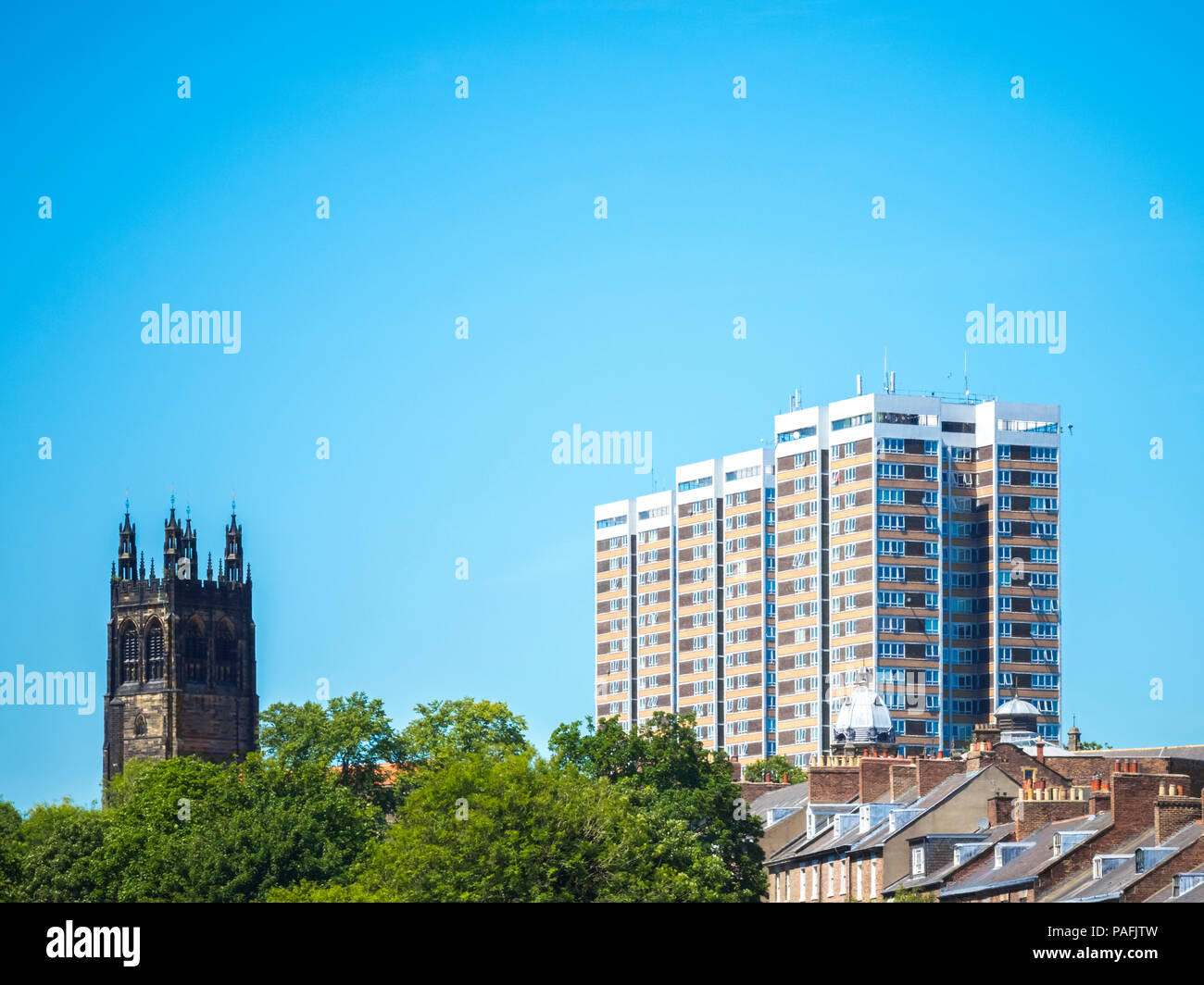 High rise blocks of flats looming over older buildings in Newcastle ...